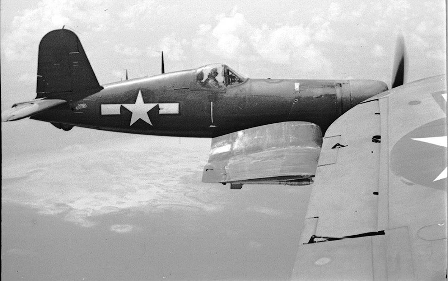 Asisbiz Vought AU 1 Corsair VMF 122 on patrol over Palau Islands 1945-03