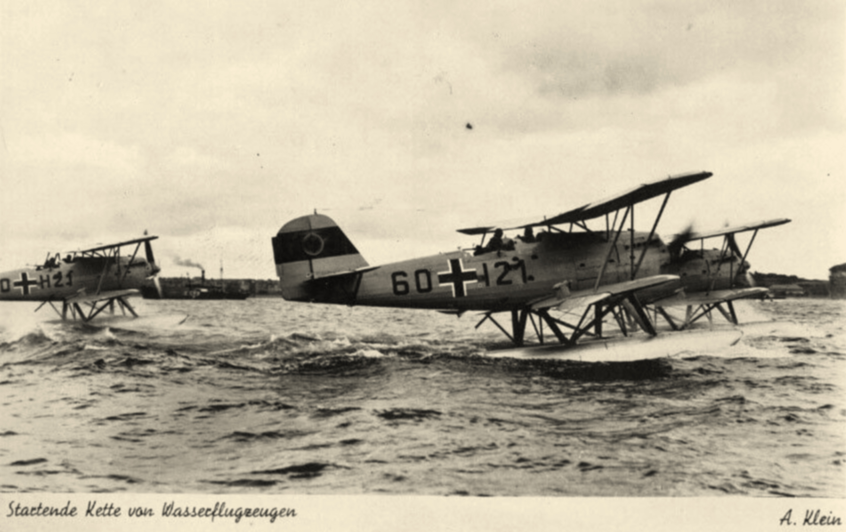 Asisbiz Heinkel He 60 floatplane 60+H21 and 60+I21 prior to take off ...